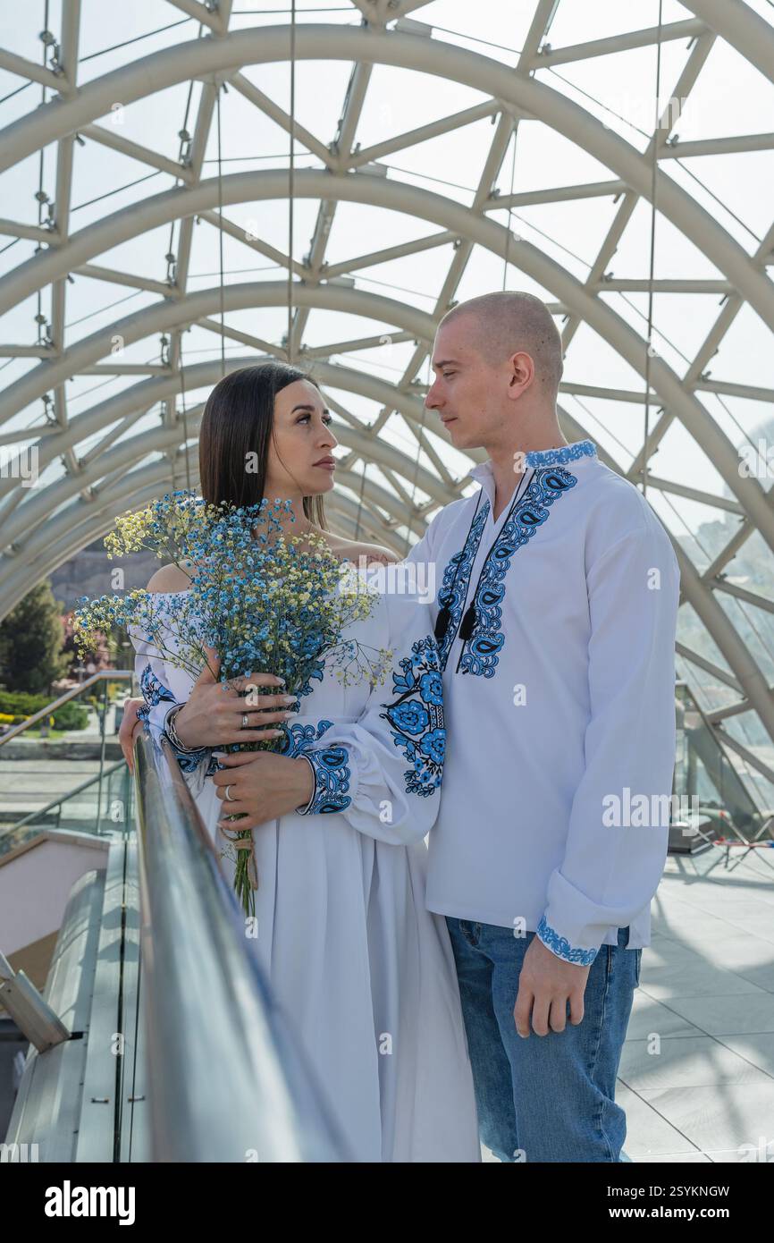 Elegant Ukrainian wedding couple near modern architecture Stock Photo ...