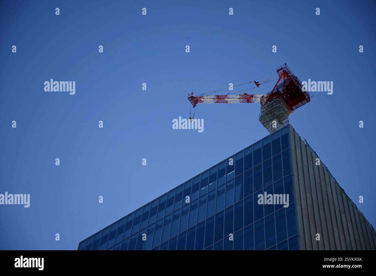 Crawler Tower crane on a skyscraper construction site in Ginza, Chūō ...