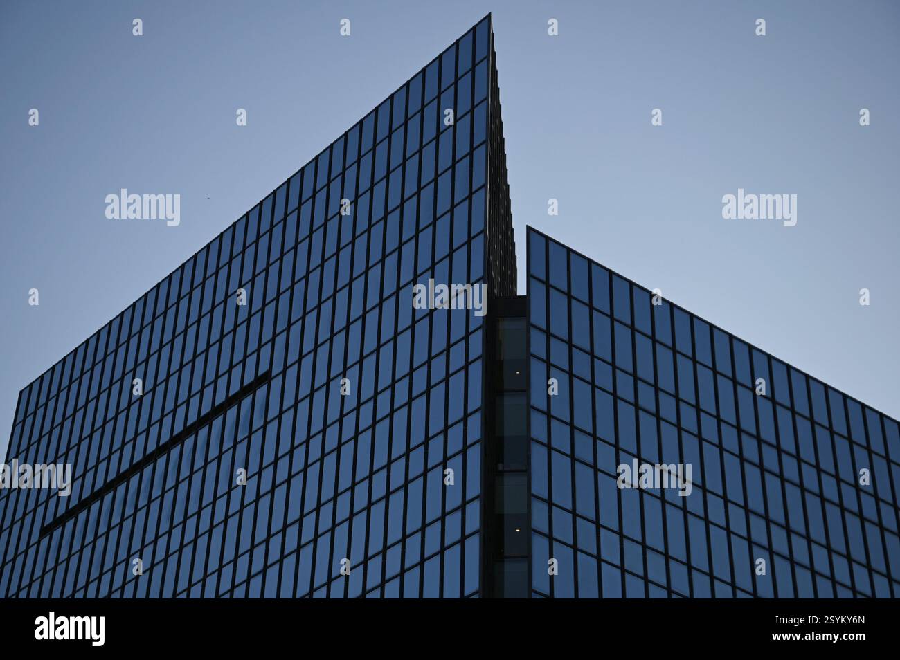 Landscape with scenic view of a modern steel and glass skyscraper ...