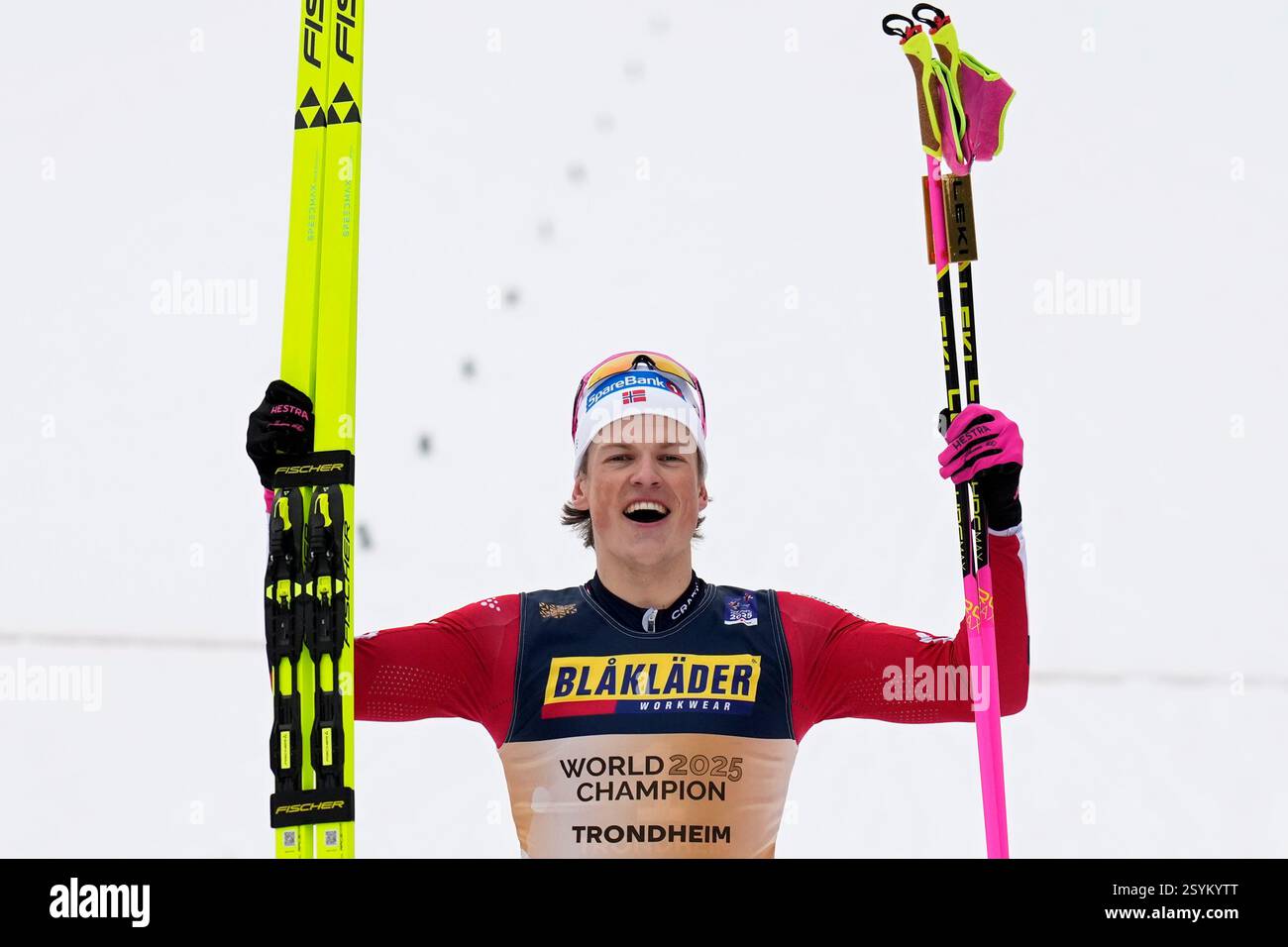 Johannes Hoesflot Klaebo, of Norway, celebrates after winning the men's ...