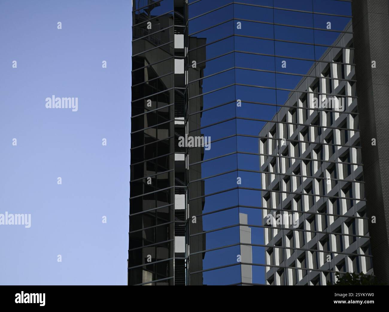 Landscape with scenic view of a modern steel and glass skyscraper ...
