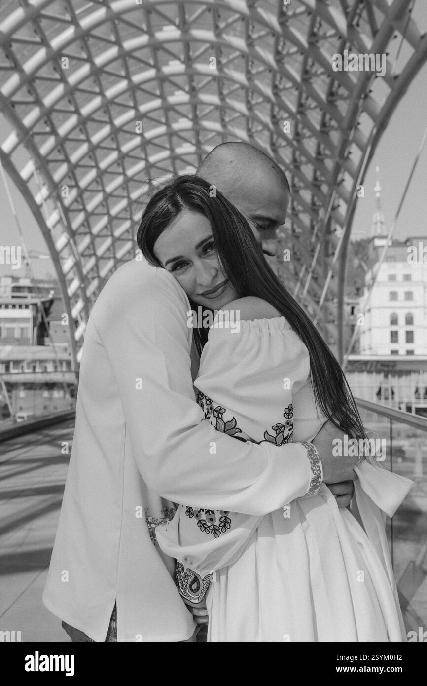 Elegant Ukrainian wedding couple near modern architecture Stock Photo ...