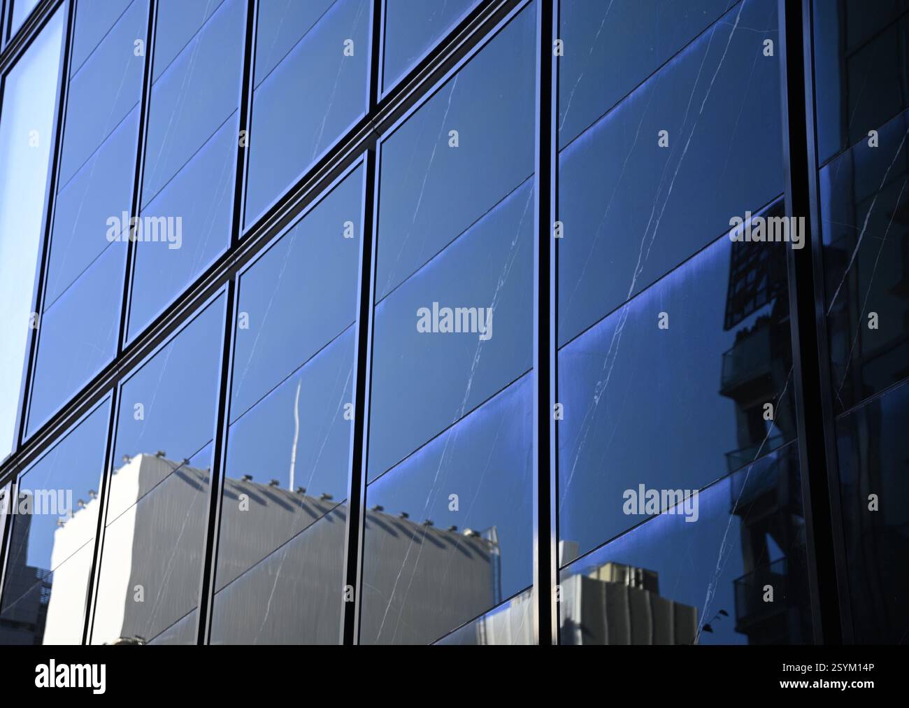 Landscape with scenic view of a modern steel and glass skyscraper ...