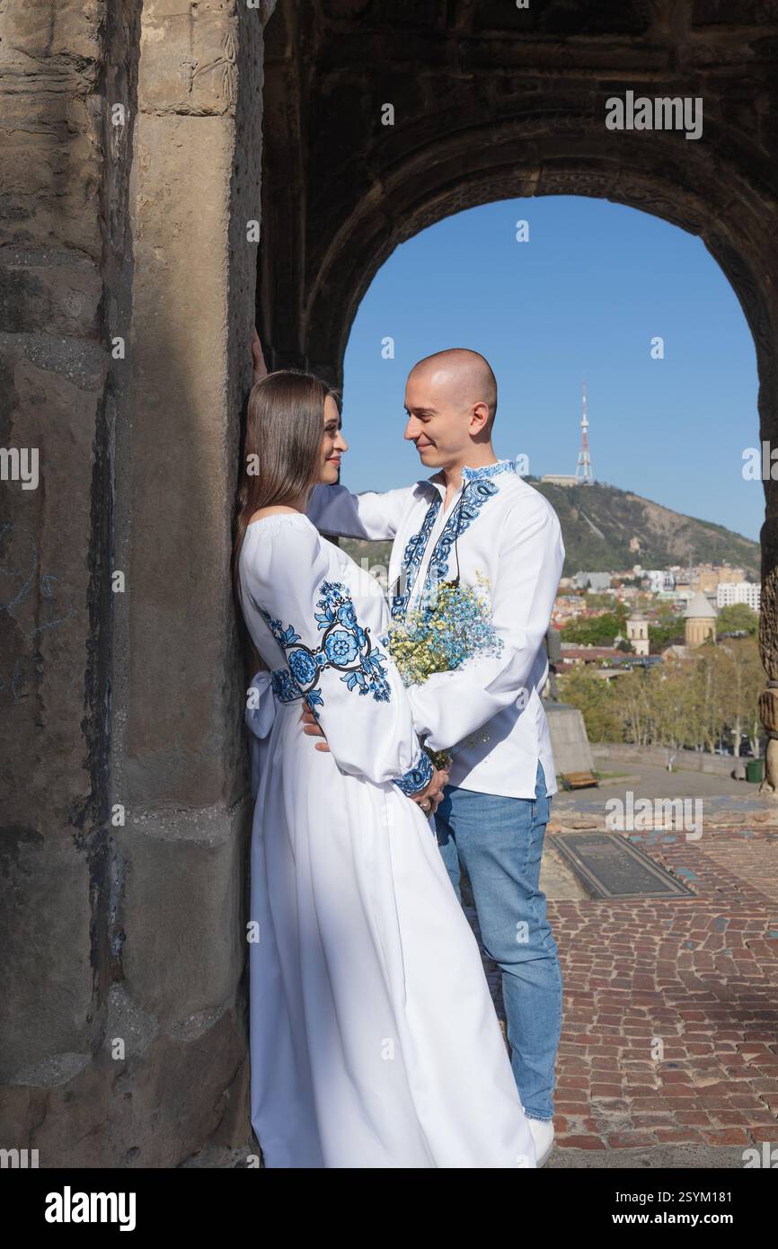 Summer wedding in Georgia: Romantic couple in Ukrainian embroidered ...