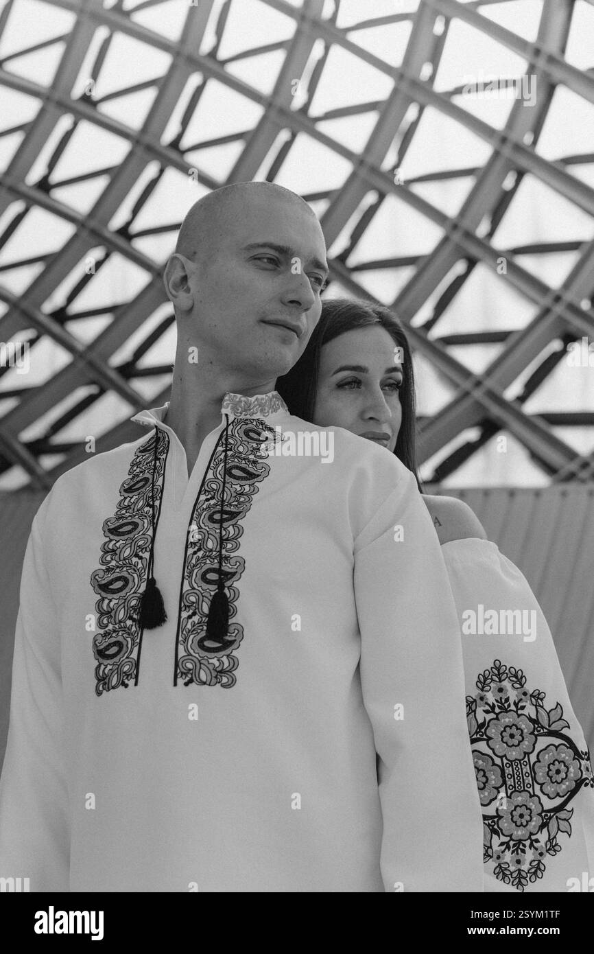 Elegant Ukrainian wedding couple near modern architecture Stock Photo ...