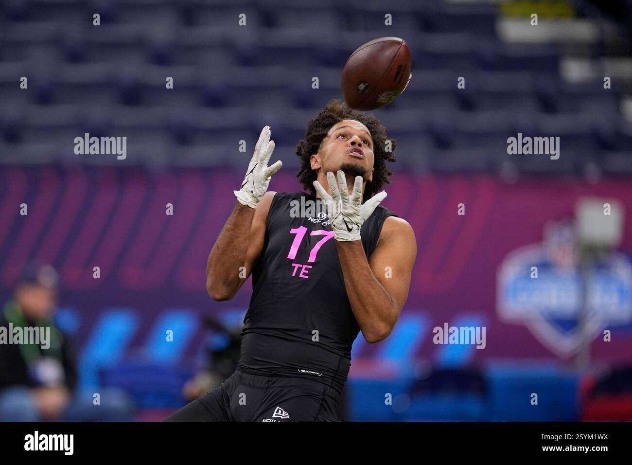 North Carolina tight end Bryson Nesbit runs a drill at the NFL football ...