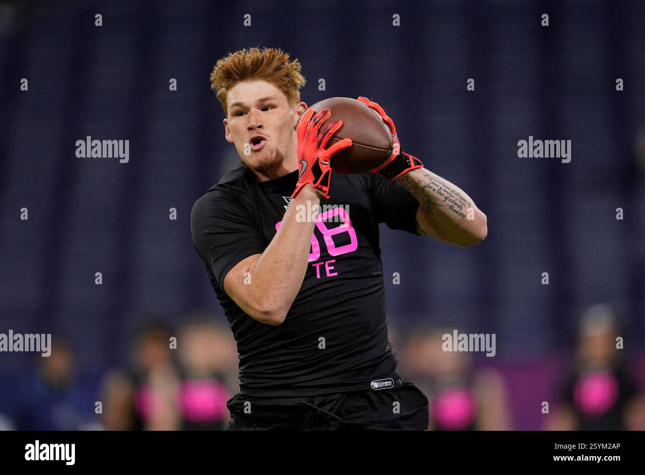 Oregon tight end Terrance Ferguson runs a drill at the NFL football ...
