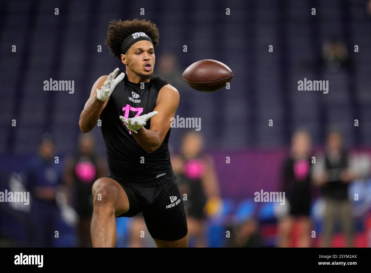 North Carolina tight end Bryson Nesbit runs a drill at the NFL football ...