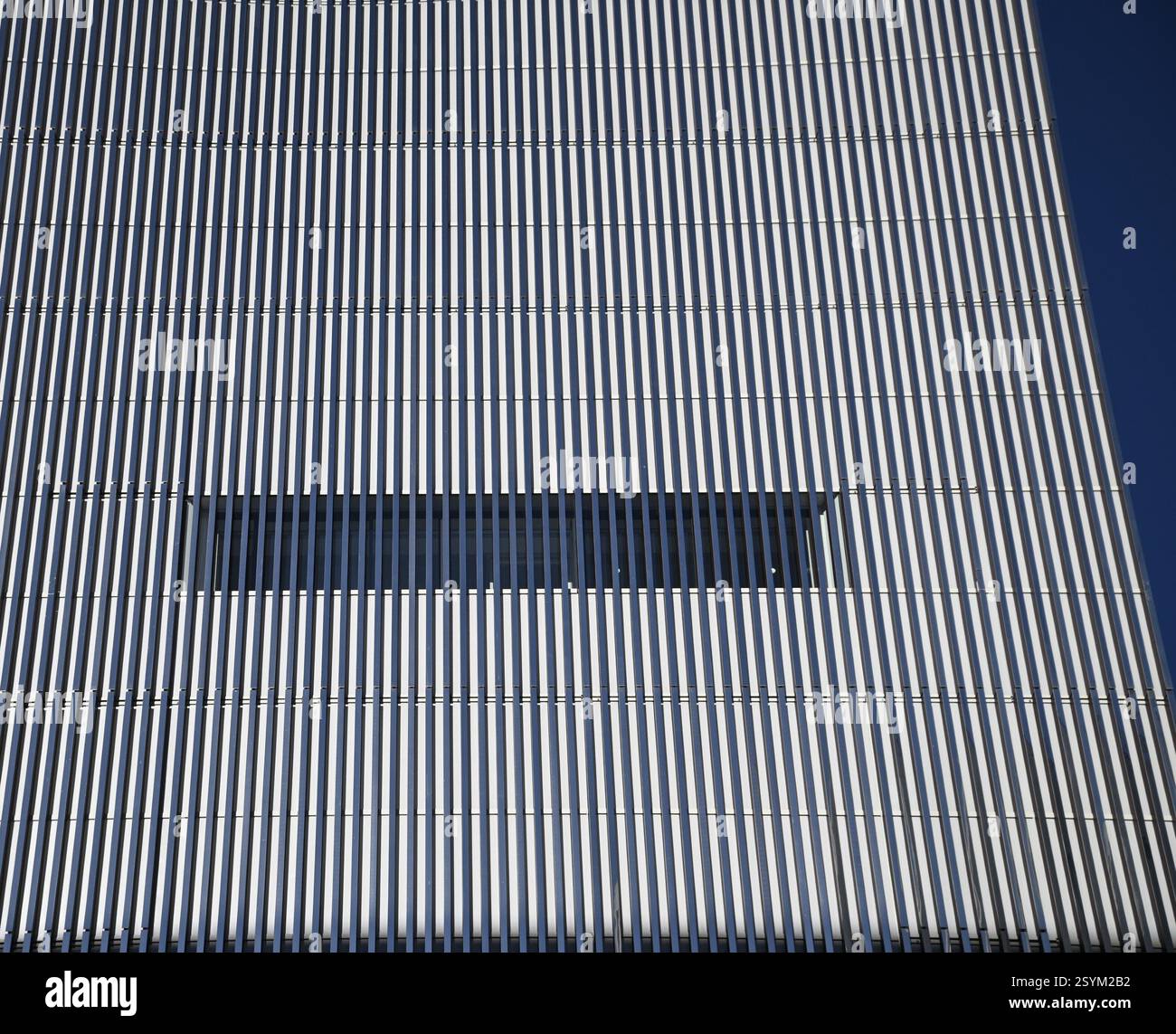 Landscape with scenic view of a modern steel and glass skyscraper ...