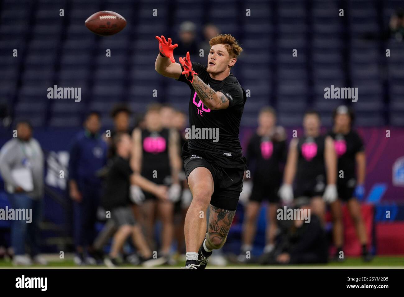 Oregon tight end Terrance Ferguson runs a drill at the NFL football ...