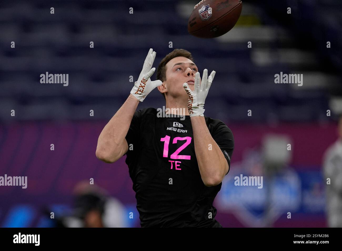 Texas tight end Gunnar Helm runs a drill at the NFL football scouting ...