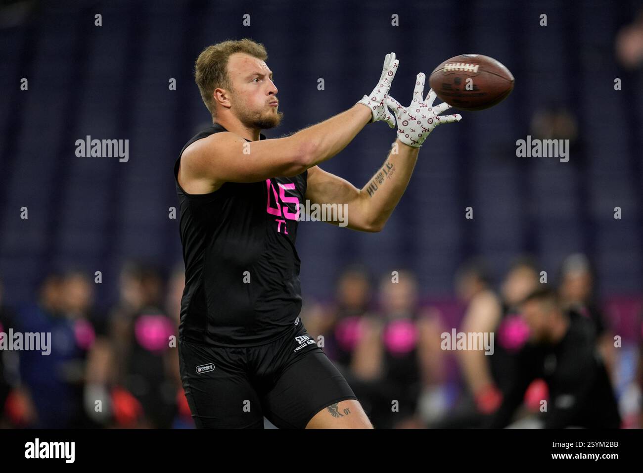 Alabama tight end CJ Dippre runs a drill at the NFL football scouting ...