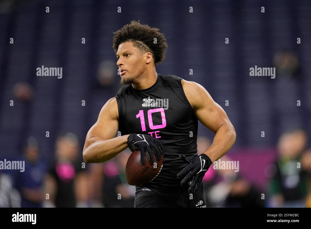 Syracuse tight end Oronde Gadsden II runs a drill at the NFL football ...