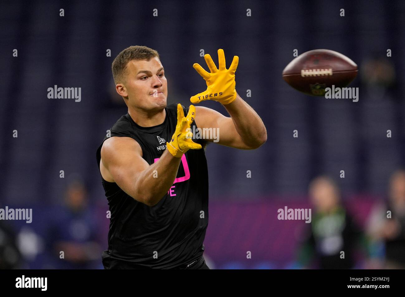 LSU tight end Mason Taylor runs a drill at the NFL football scouting ...