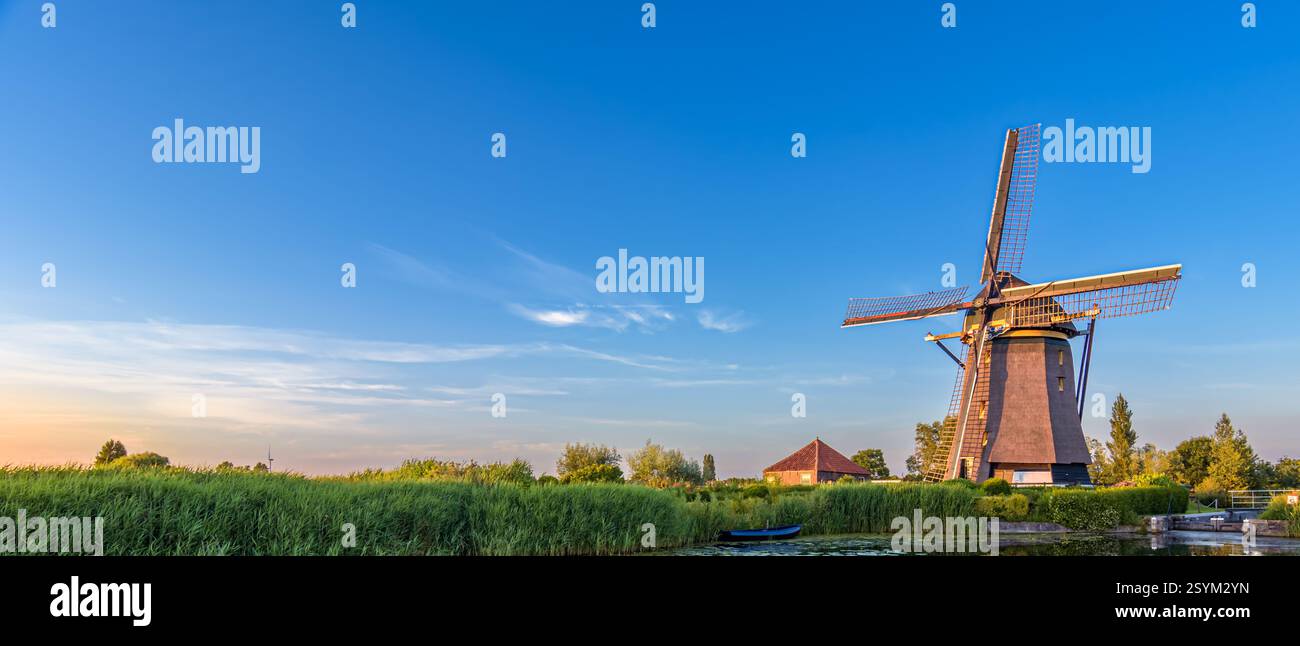 The Rietveldse mill in Hazerswoude-dorp during the sunset Stock Photo ...