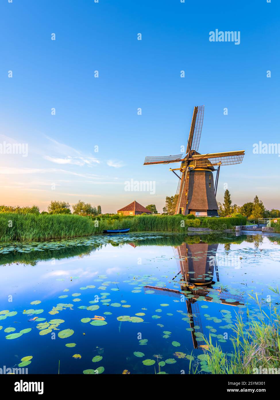 The Rietveldse mill in Hazerswoude-dorp during the sunset Stock Photo ...