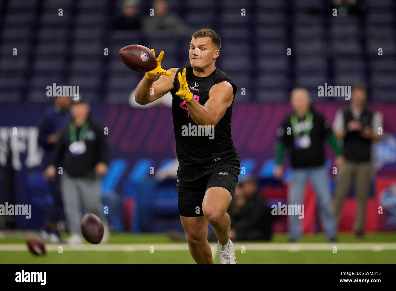 LSU tight end Mason Taylor runs a drill at the NFL football scouting ...