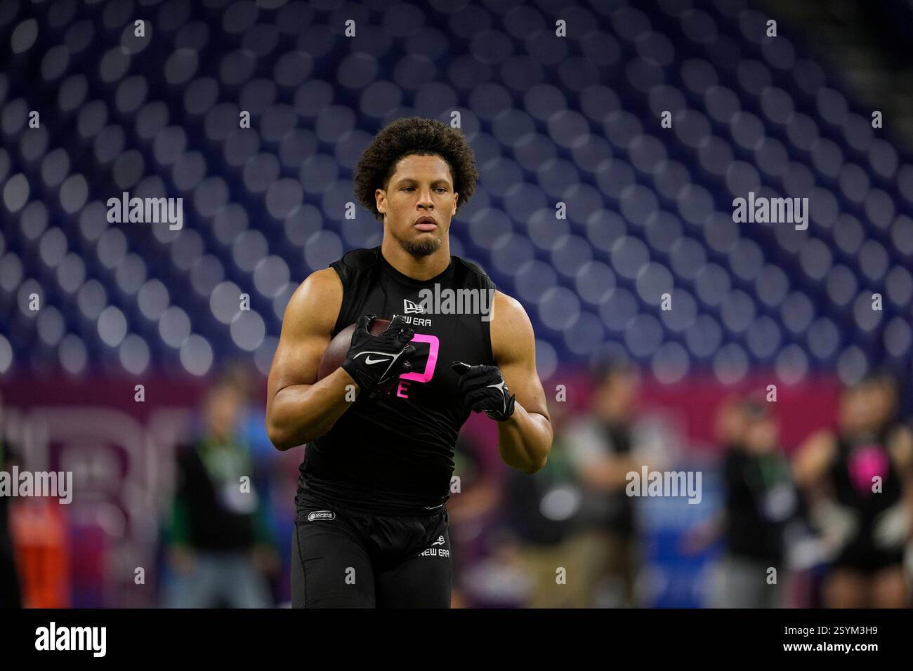 Syracuse tight end Oronde Gadsden II runs a drill at the NFL football ...