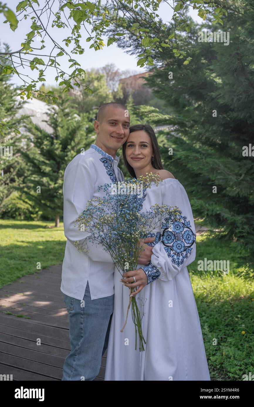 Elegant Ukrainian wedding couple near modern architecture Stock Photo ...