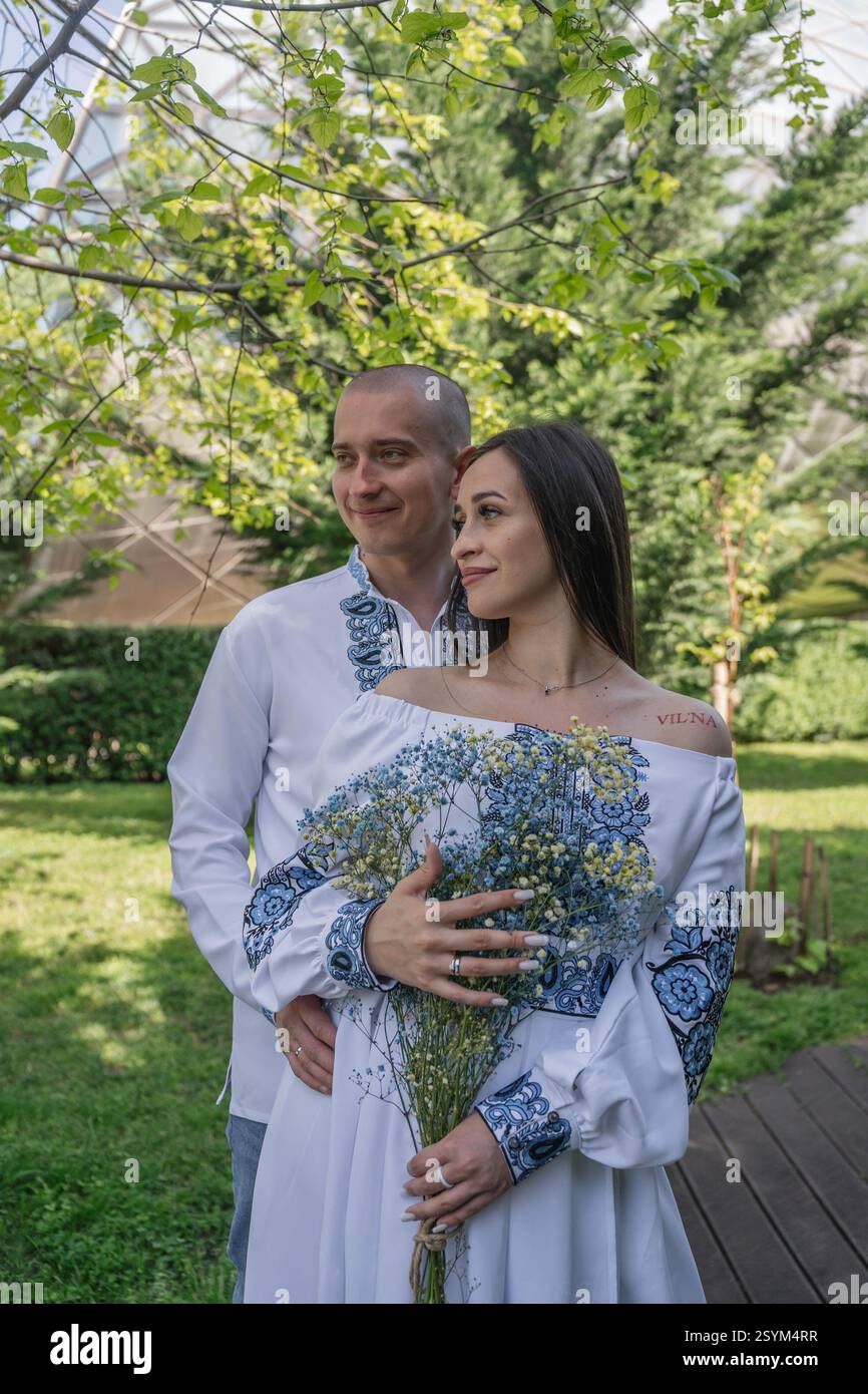 Elegant Ukrainian wedding couple near modern architecture Stock Photo ...