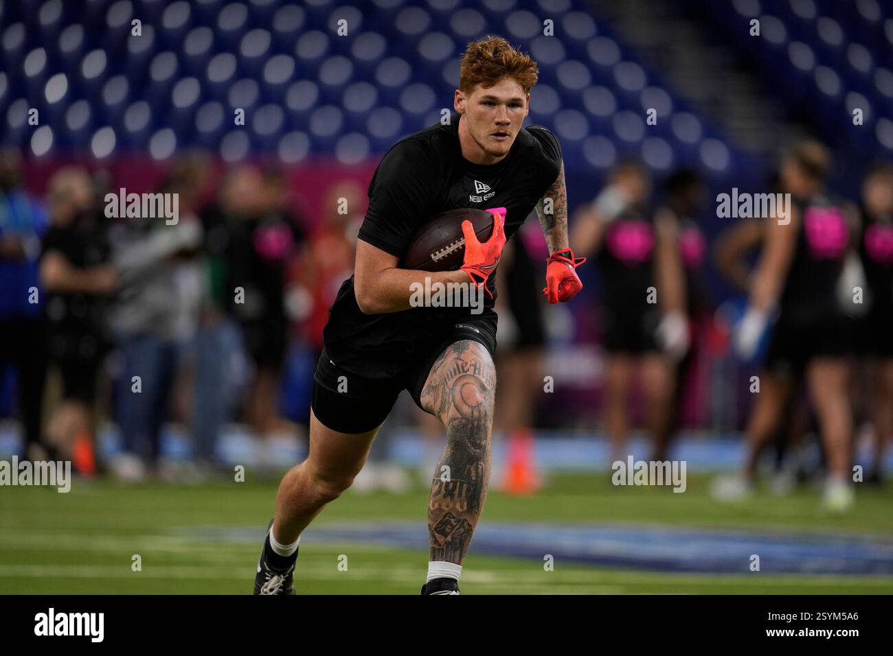 Oregon tight end Terrance Ferguson runs a drill at the NFL football ...