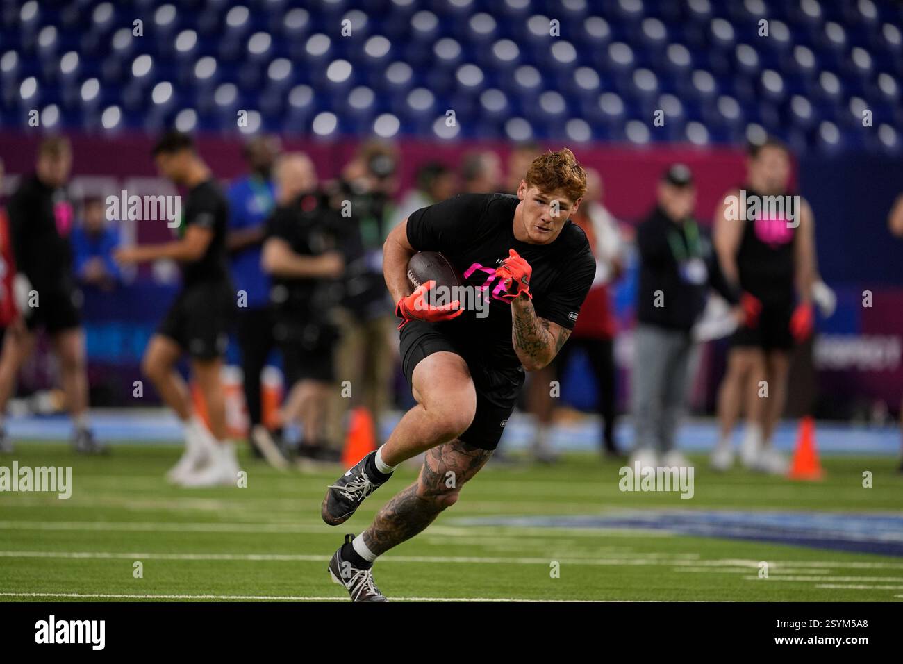 Oregon tight end Terrance Ferguson runs a drill at the NFL football ...