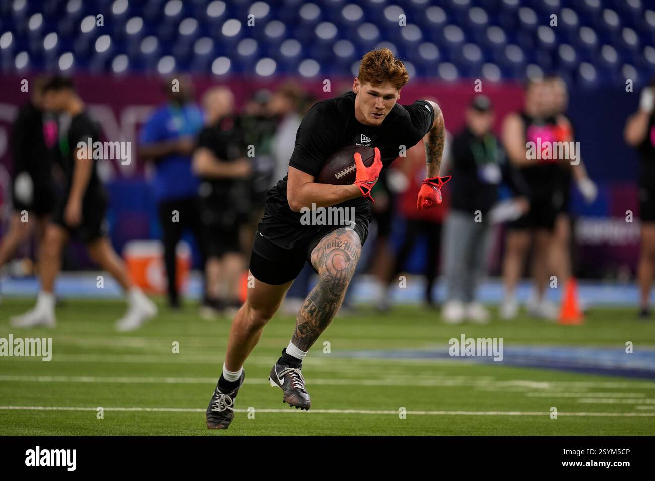 Oregon tight end Terrance Ferguson runs a drill at the NFL football ...