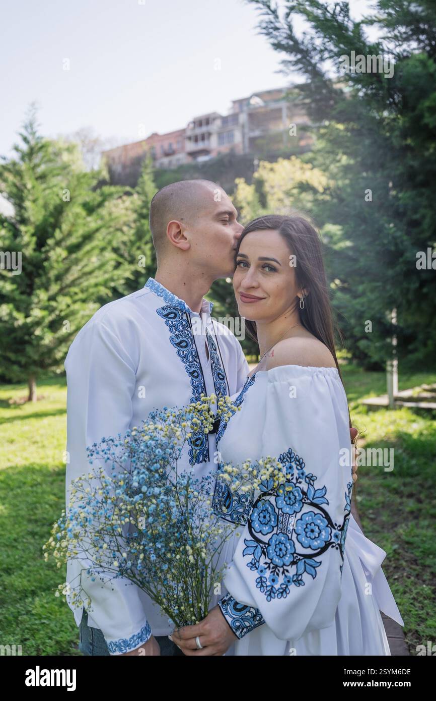 Elegant Ukrainian wedding couple near modern architecture Stock Photo ...