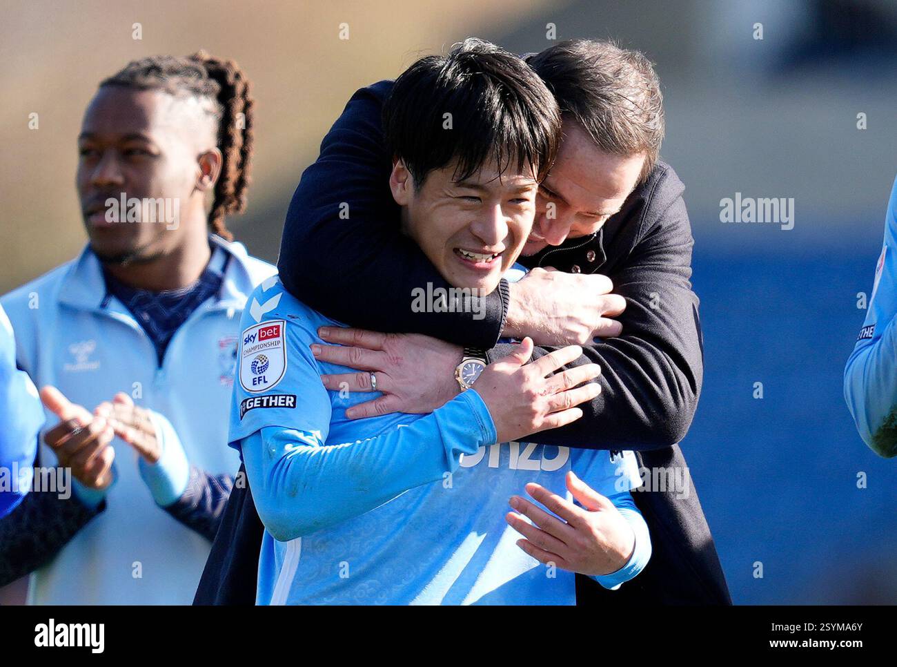 Coventry City's Tatsuhiro Sakamoto (left) and head coach Frank Lampard ...