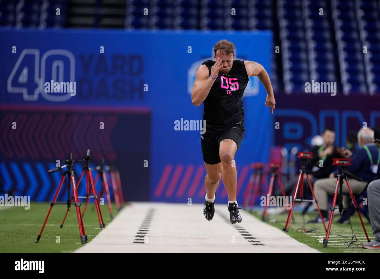 Alabama tight end CJ Dippre runs a drill at the NFL football scouting ...