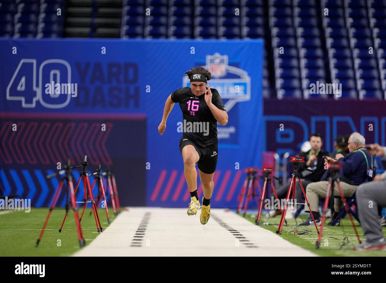 UCLA tight end Moliki Matavao runs a drill at the NFL football scouting ...