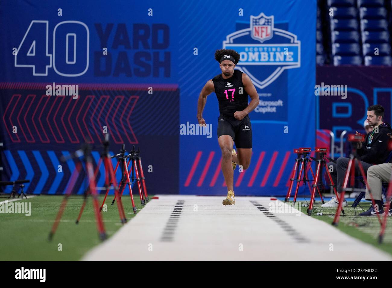 North Carolina tight end Bryson Nesbit runs a drill at the NFL football ...