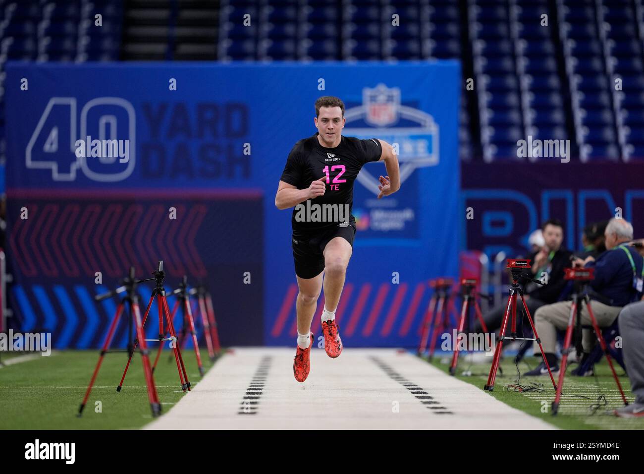 Texas tight end Gunnar Helm runs a drill at the NFL football scouting ...