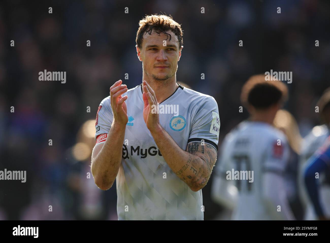 LONDON, UK - 1st Mar 2025: Jake Cooper of Millwall applauds the fans ...