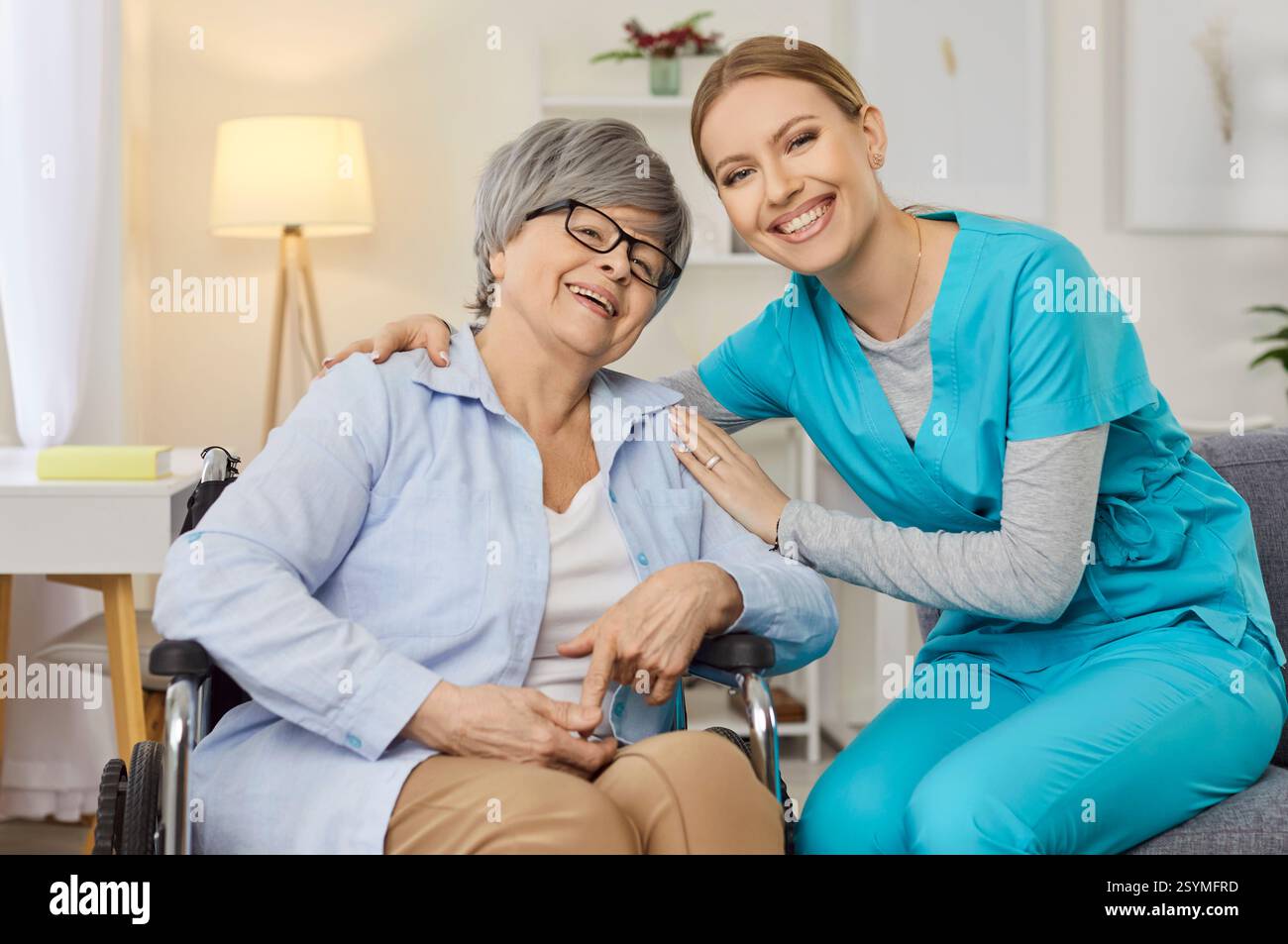 Old elderly woman with physical disability poses in wheelchair near ...