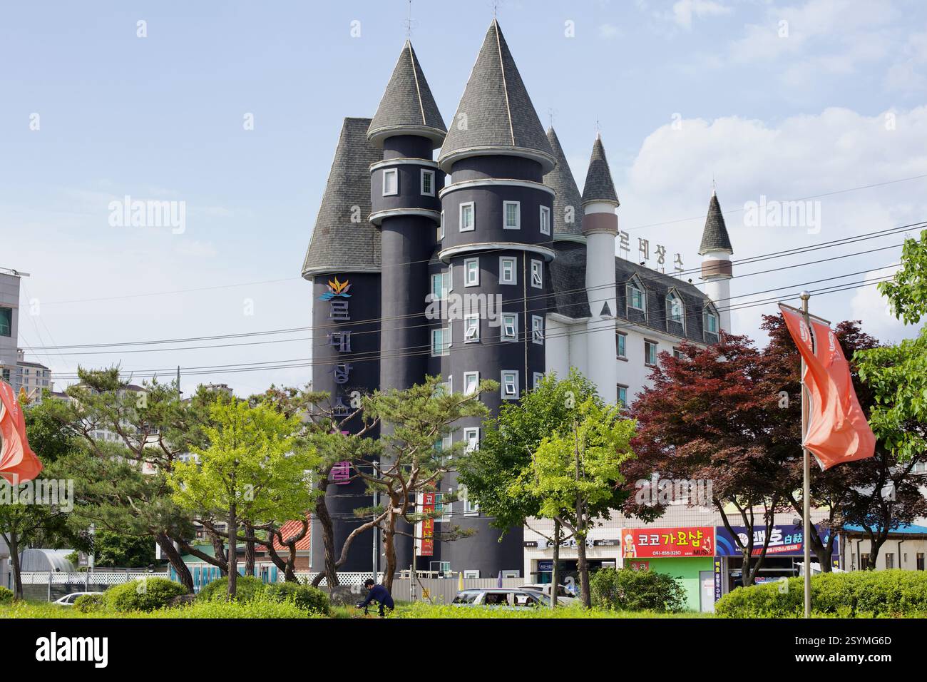 Gongju City, South Korea - May 27th, 2021: A castle-themed hotel with towering spires and a dark ...