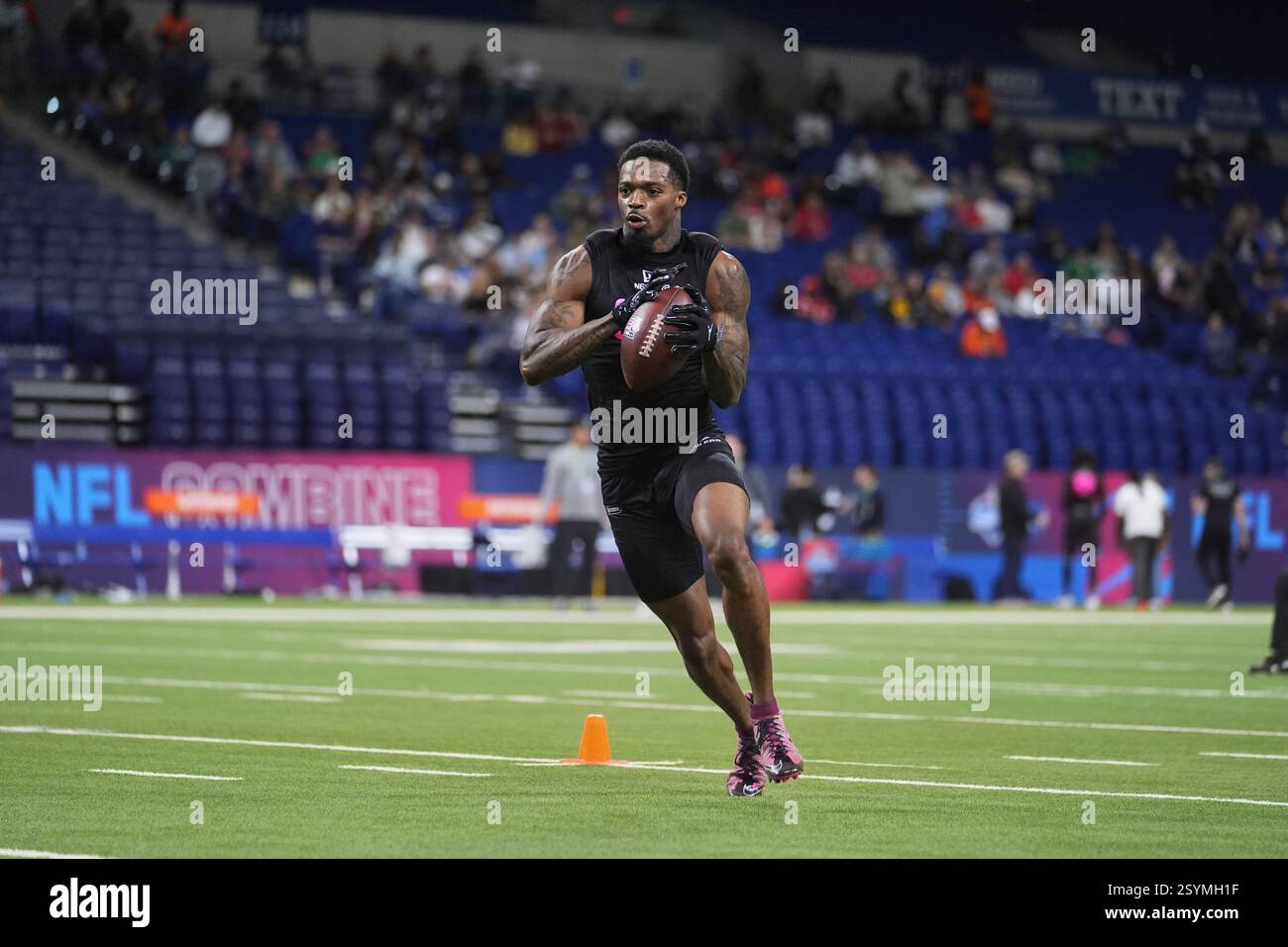 Syracuse defensive back Alijah Clark runs a drill at the NFL football scouting combine in ...