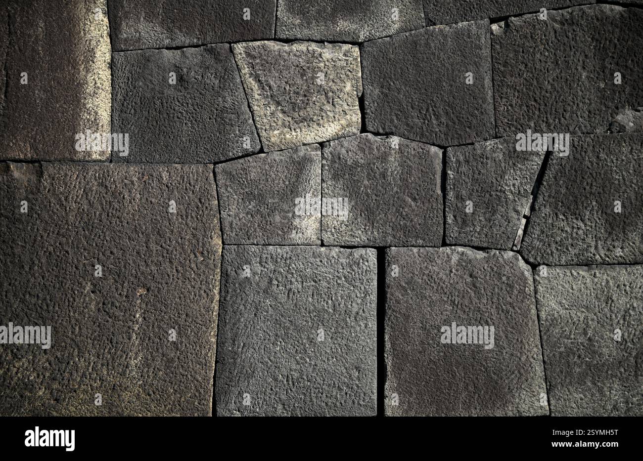 The imposing stone walls of the Imperial Palace in Tokyo stand as ...