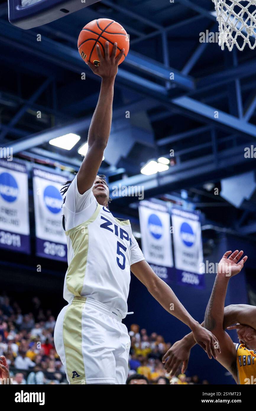 AKRON, OH - FEBRUARY 28: Akron Zips guard Tavari Johnson (5) scores ...