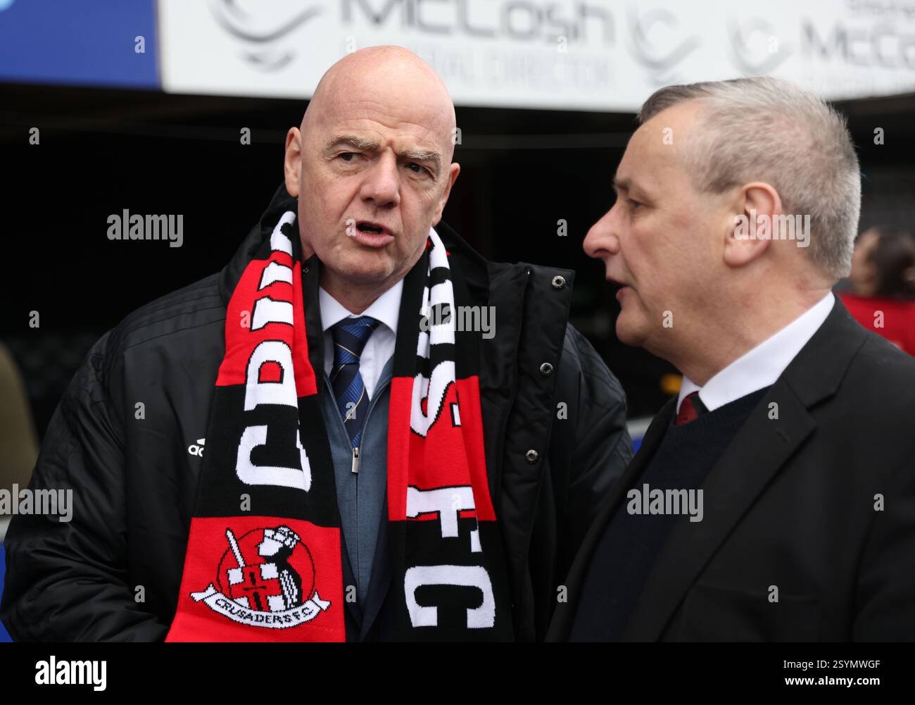 FIFA President Gianni Infantino wearing a Crusaders scarf with ...