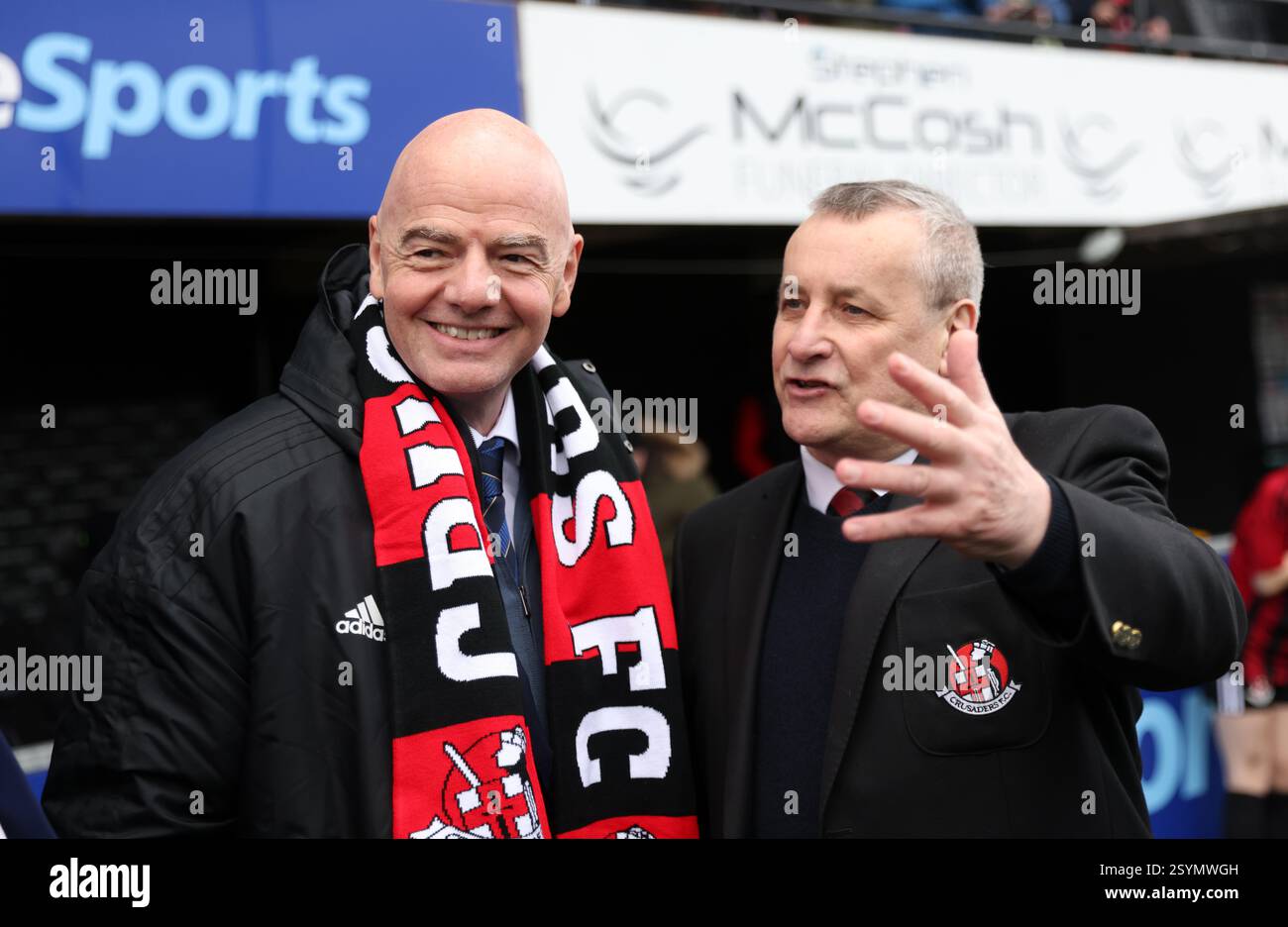 FIFA President Gianni Infantino wearing a Crusaders scarf with ...