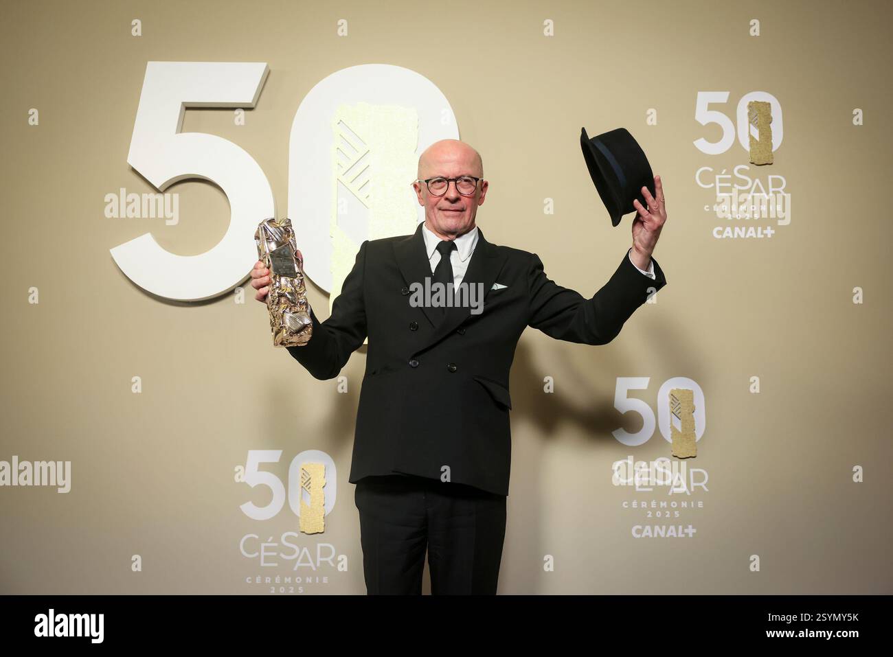 French director Jacques Audiard poses after receiving the Best Adapted ...