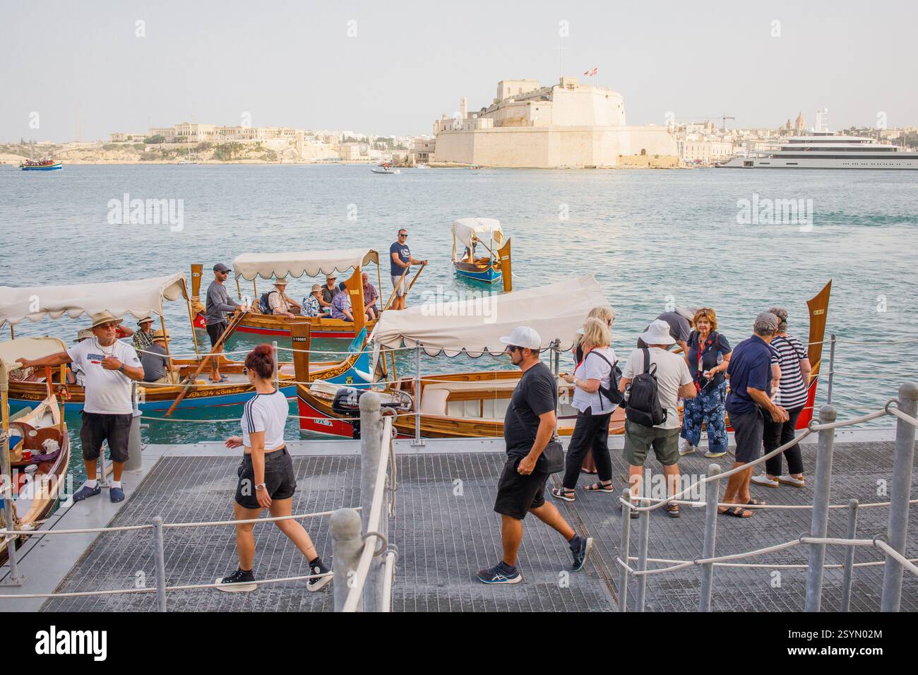 Boarding on boat trip from Valletta to three cities on traditional ...