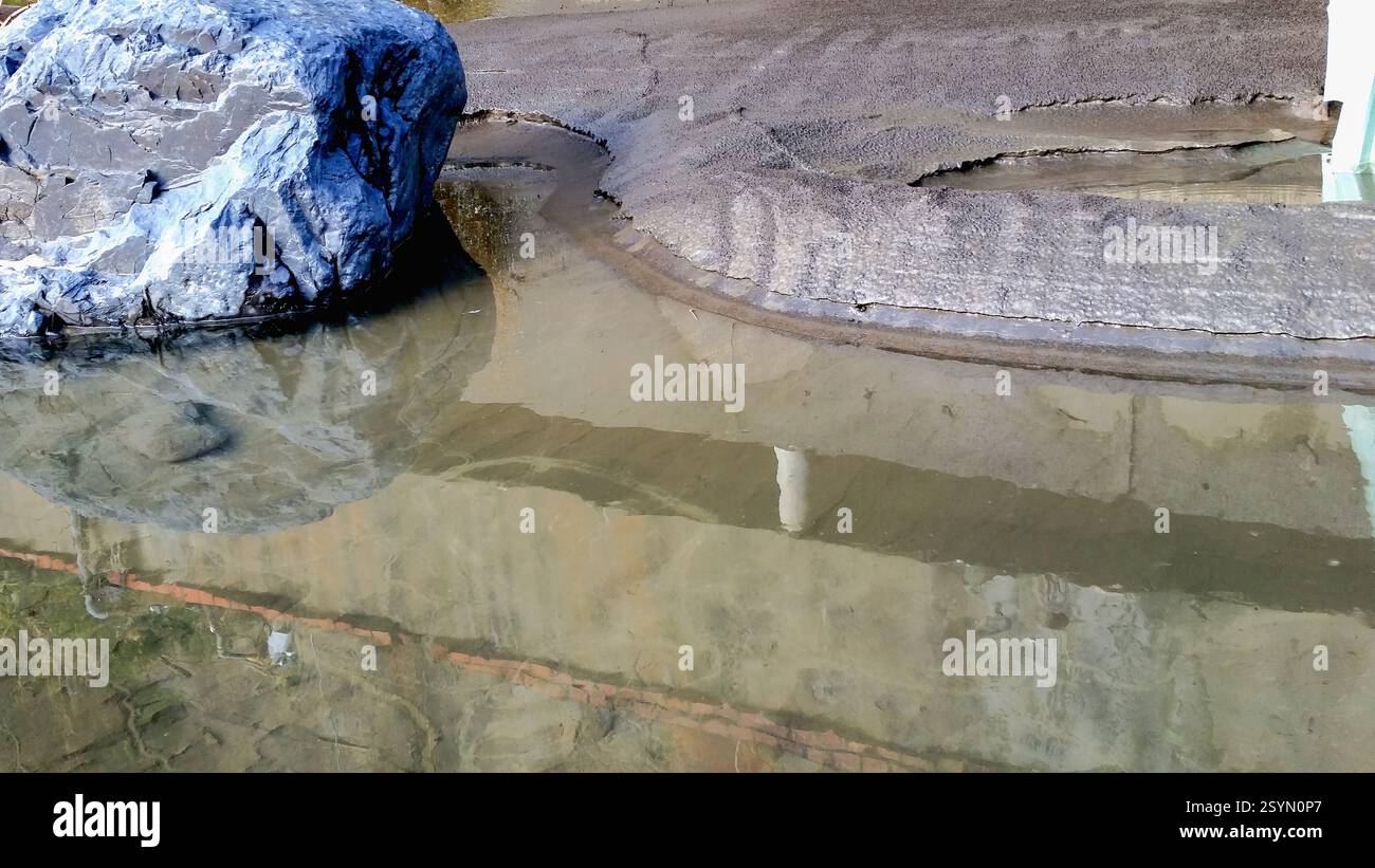 Clear river water with distinct layers of light and shadow on the ...