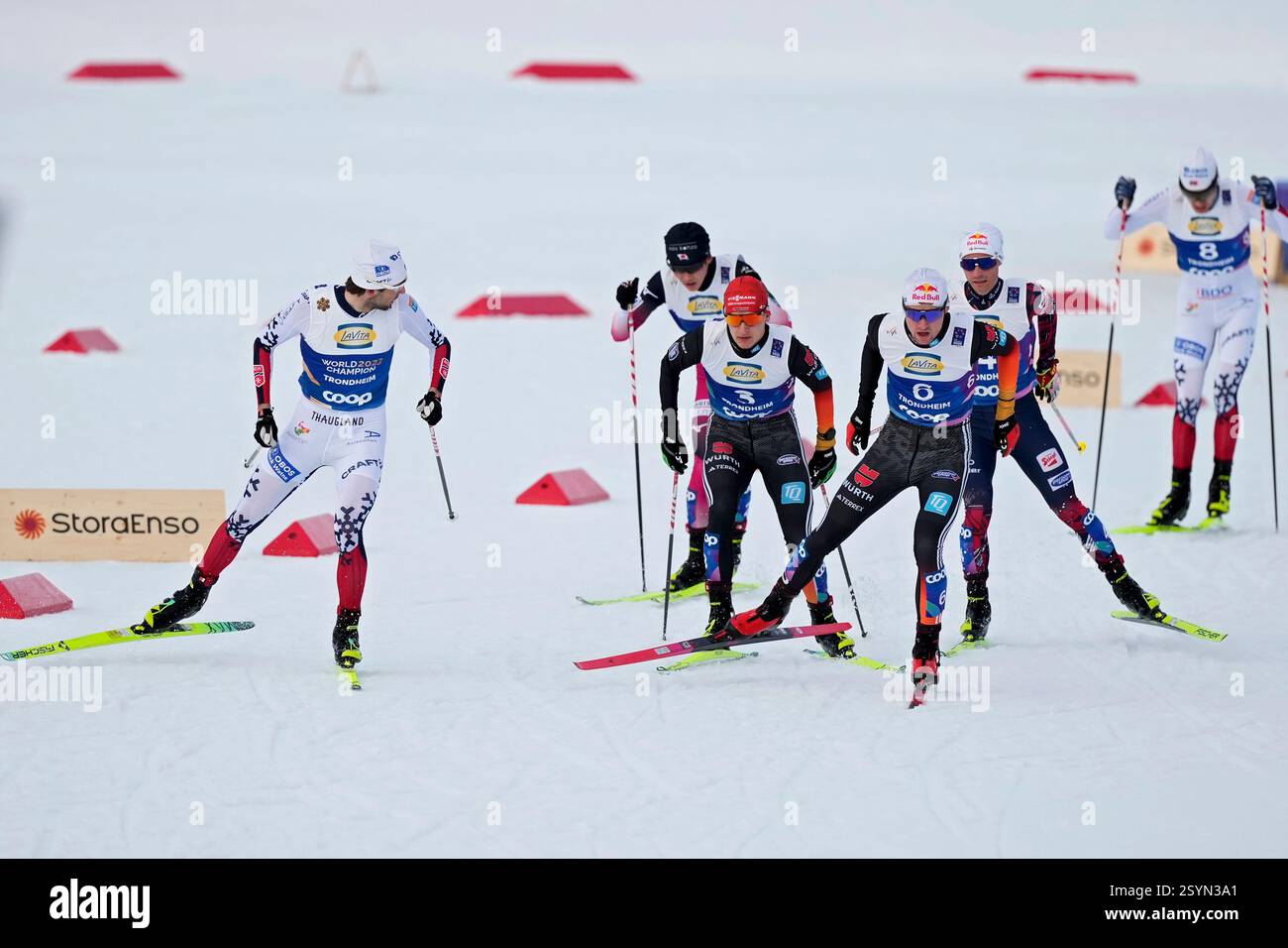 Jarl Magnus Riiber, of Norway, left, looks at Julian Schmid, of Germany ...