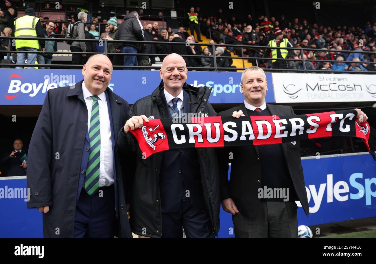 FIFA President Gianni Infantino is presented with a Crusaders scarf by ...