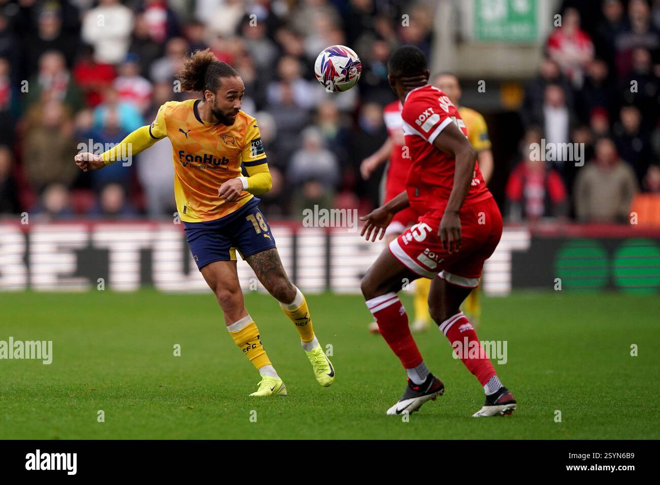Derby County's Marcus Harness (left) and Middlesbrough's Anfernee ...