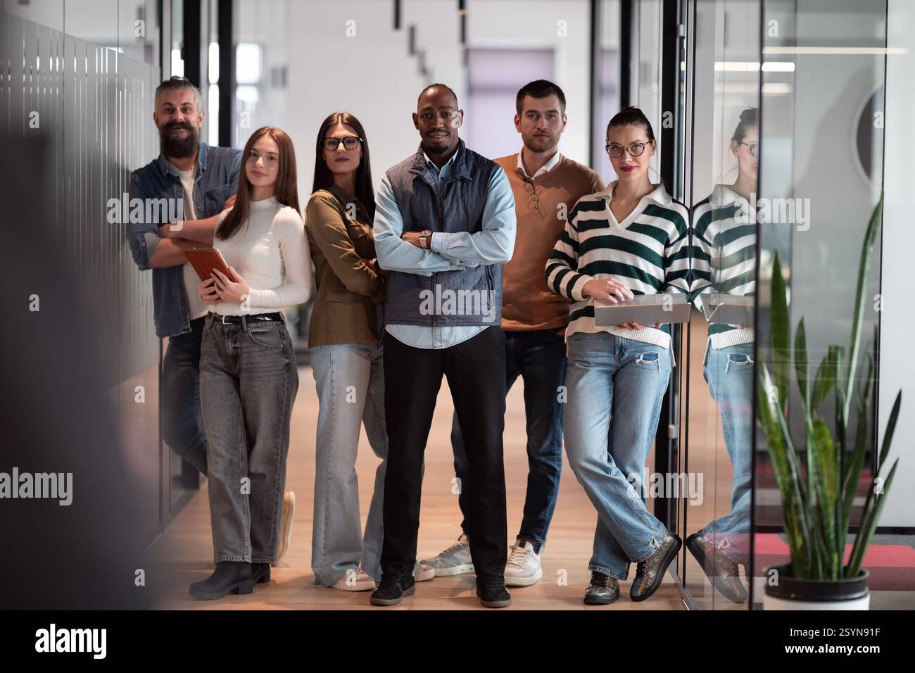 A diverse, multiethnic business team of entrepreneurs and leaders in a ...