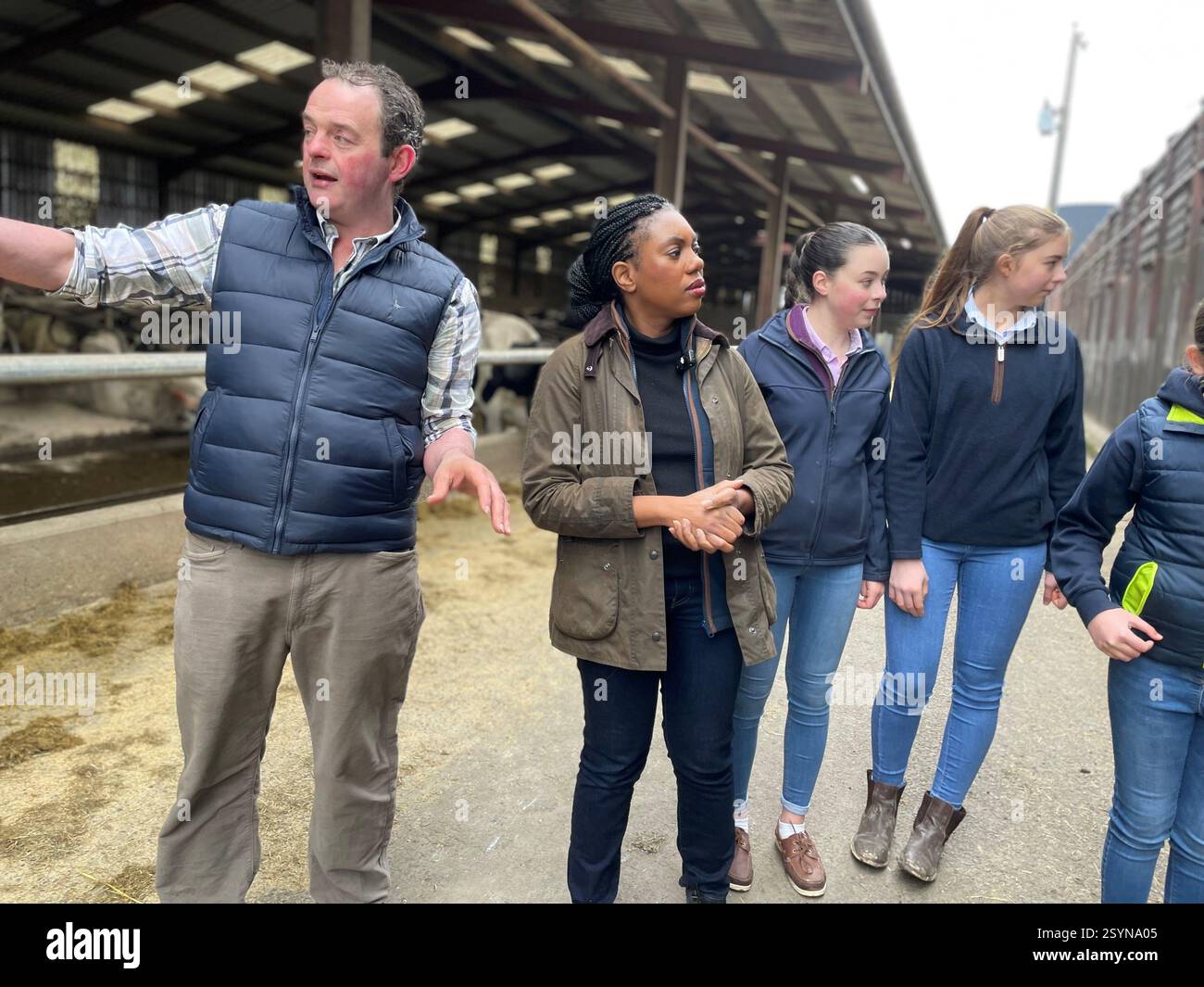 Kemi Badenoch son a tour of the farm with the Jackson family during a ...