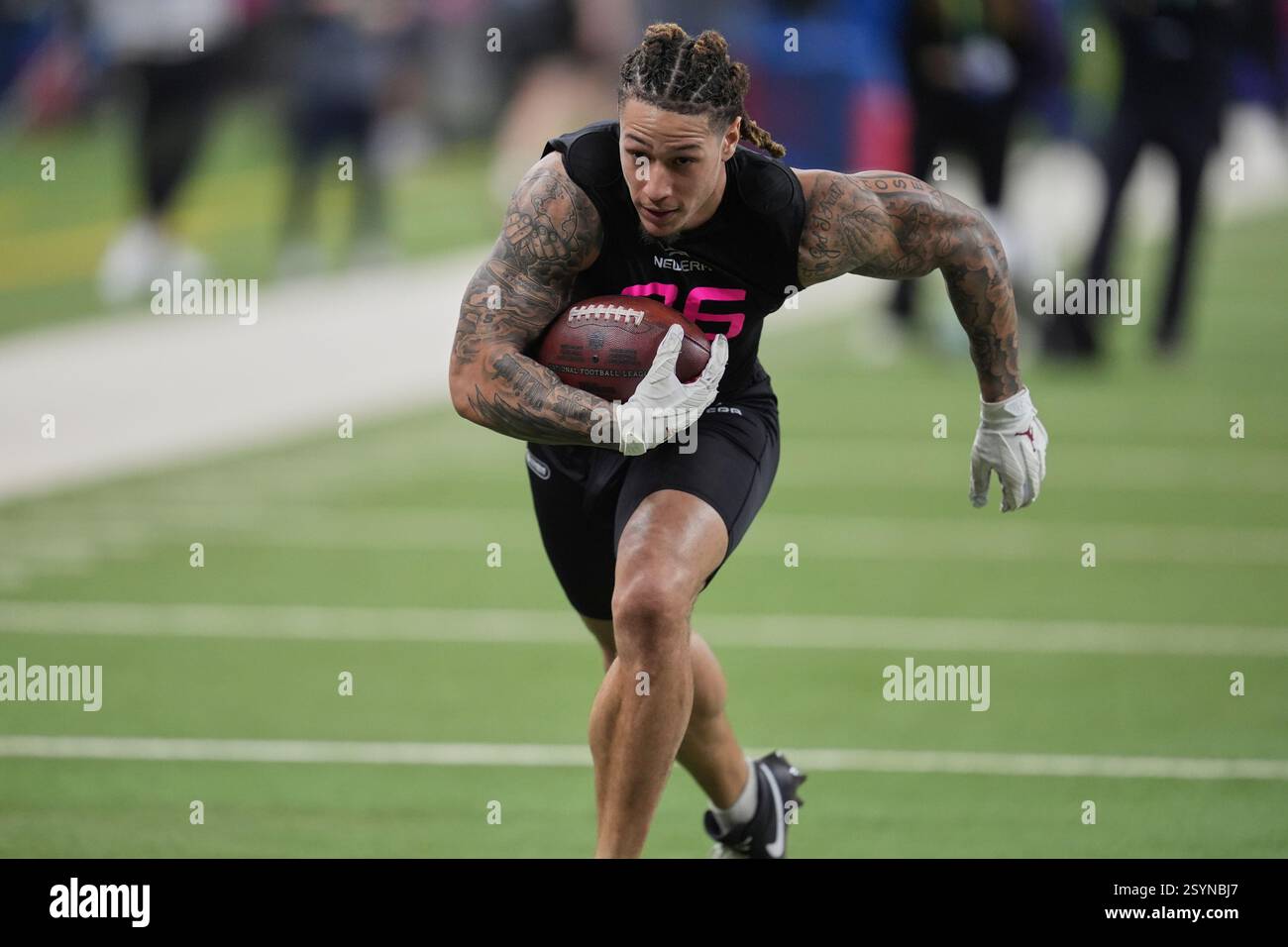 Oklahoma defensive back Billy Bowman Jr. runs a drill at the NFL football scouting combine in ...